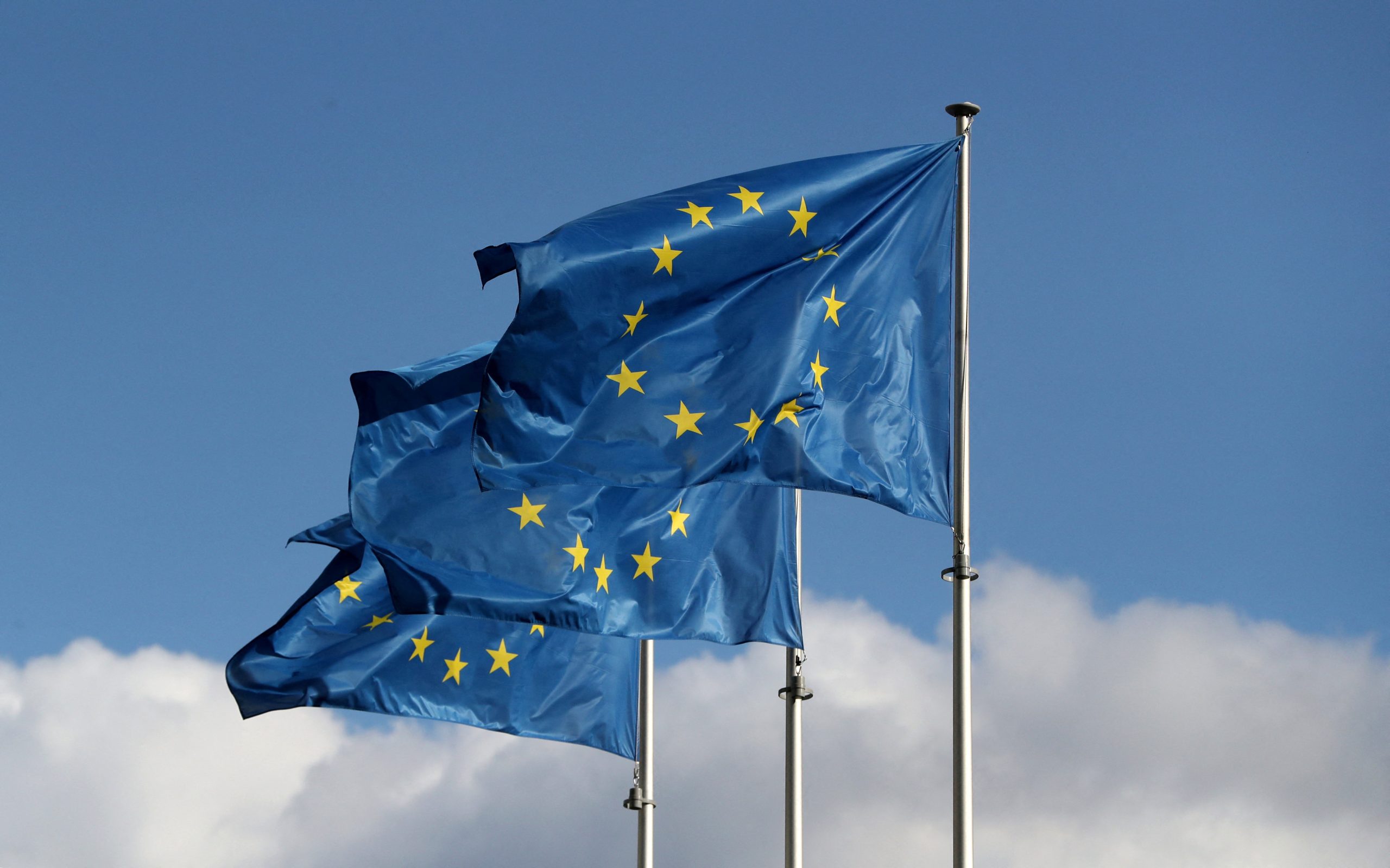 FILE PHOTO: European Union flags fly outside the EU Commission ...
